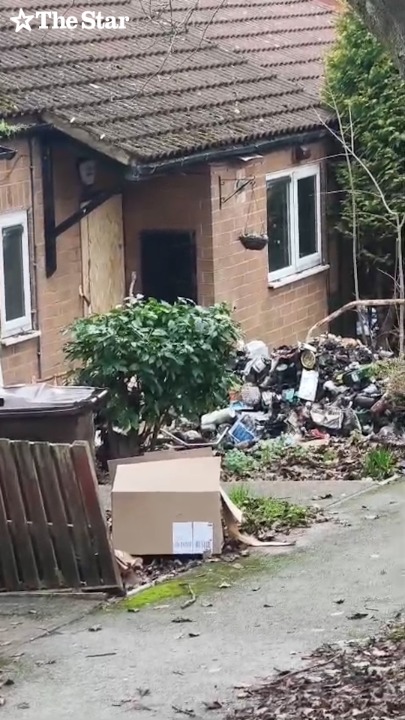 Six fire engines at the scene of a blaze on a residential cul-de-sac